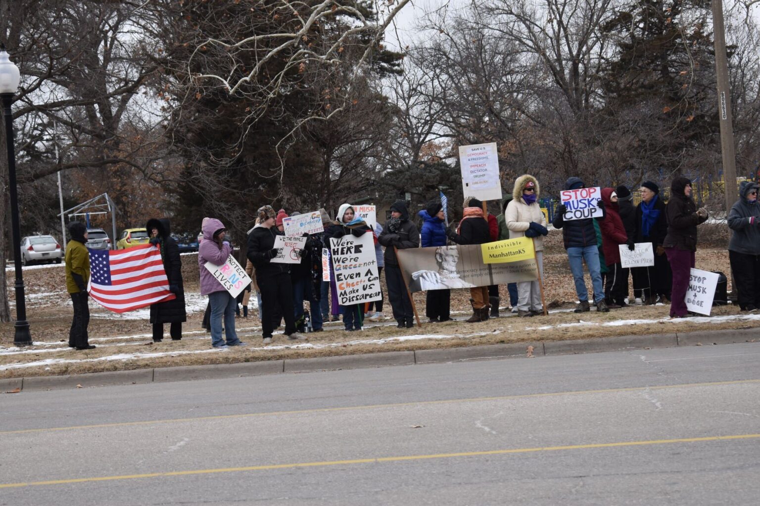 Protest against Trump, Musk gathers at city hall amid massive federal ...